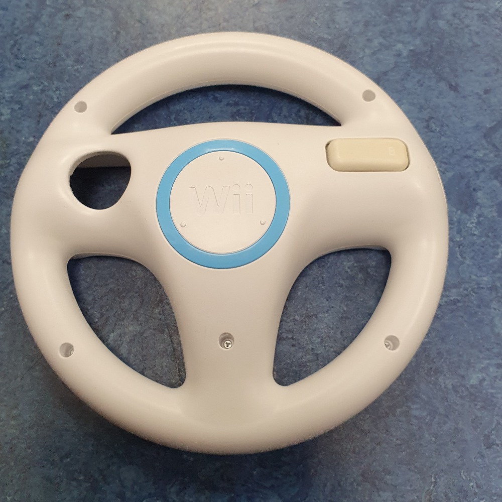 Ninetendo wii wii wheels x2 and Mario Kart - Own4Less